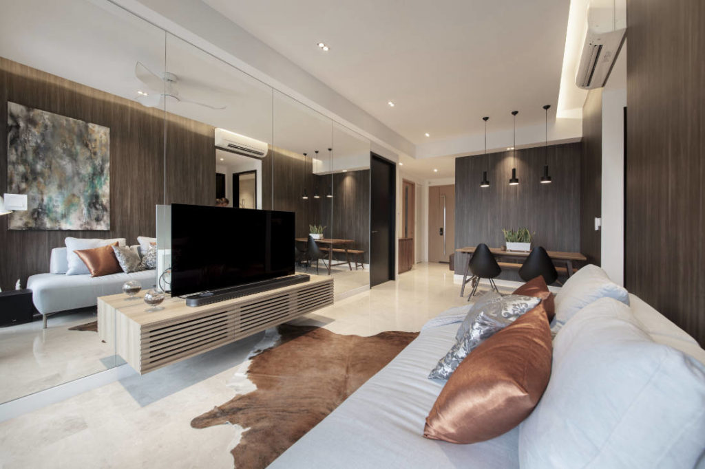 Mirrored walls & repurposed rooms expand a narrow layout | Lookbox Living