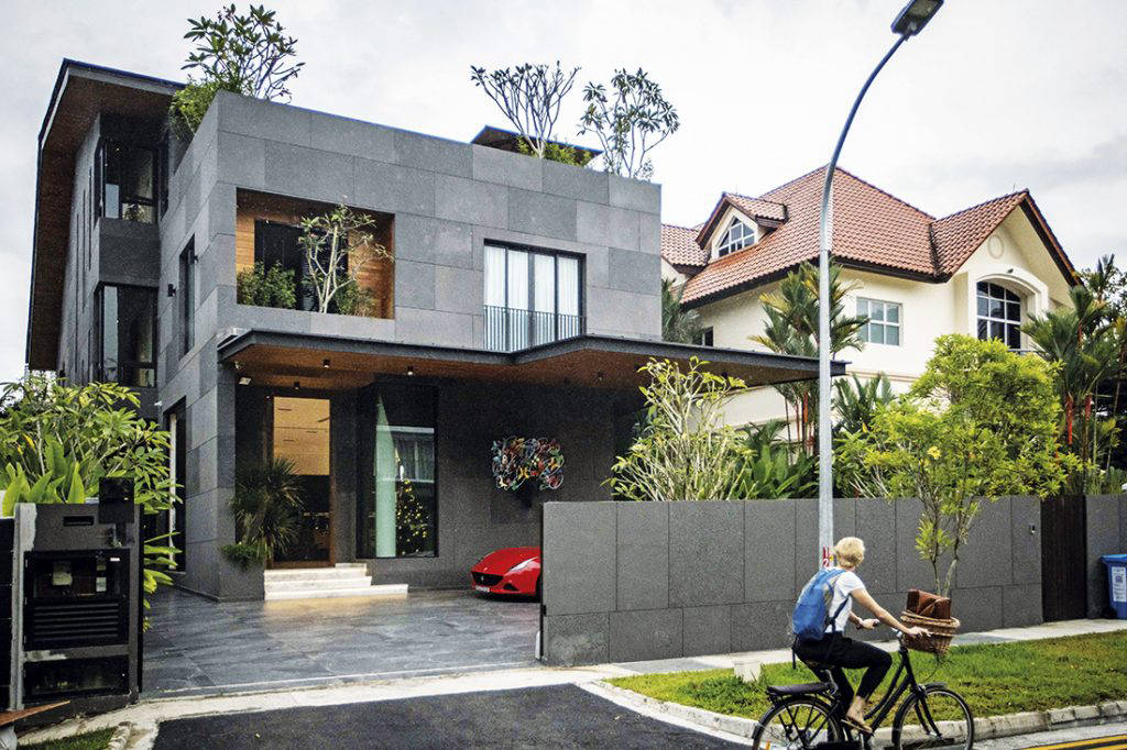 The Oasis House is an open-concept space with beautiful landscaping ...