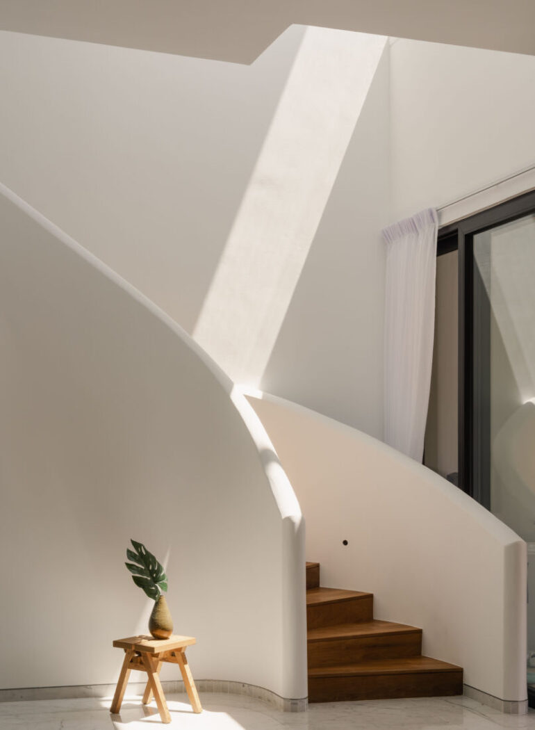 This semi-detached home has a sculptural staircase